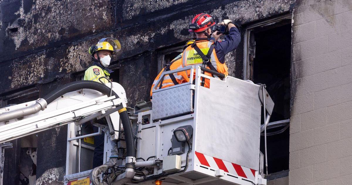 New Zealand police charge man with five murders after hostel fire