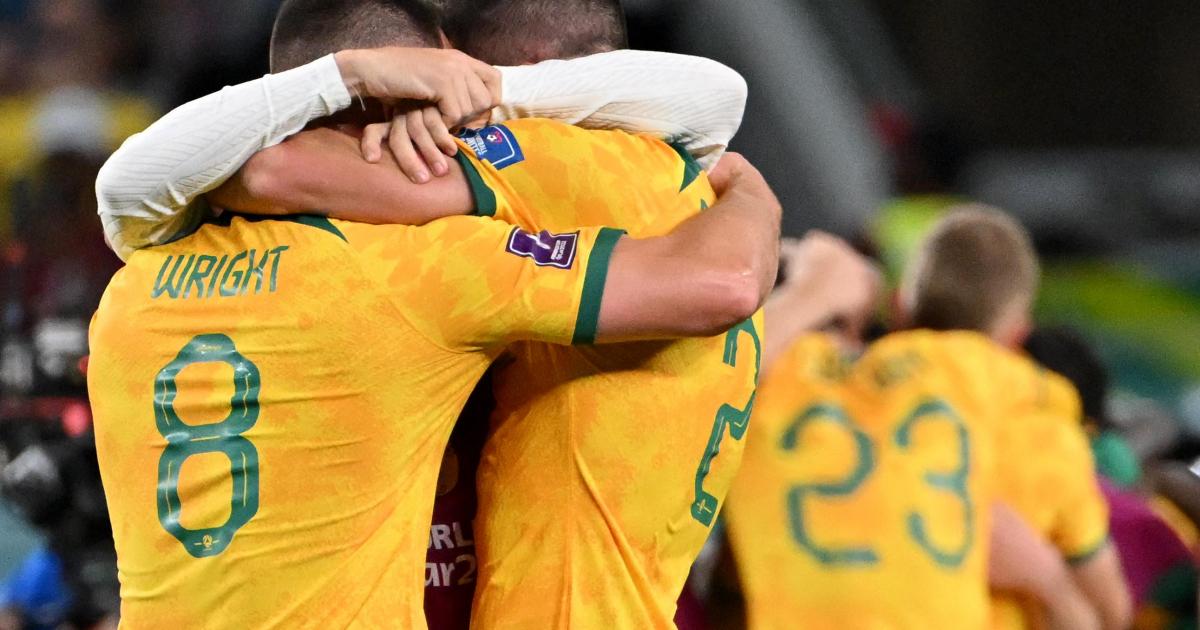 Australia reach World Cup last 16 and send Denmark home