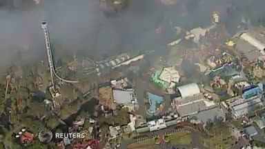 Theme park evacuated due to grass fire