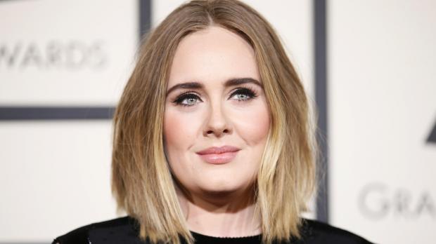 Adele reveals battle with post-natal depression