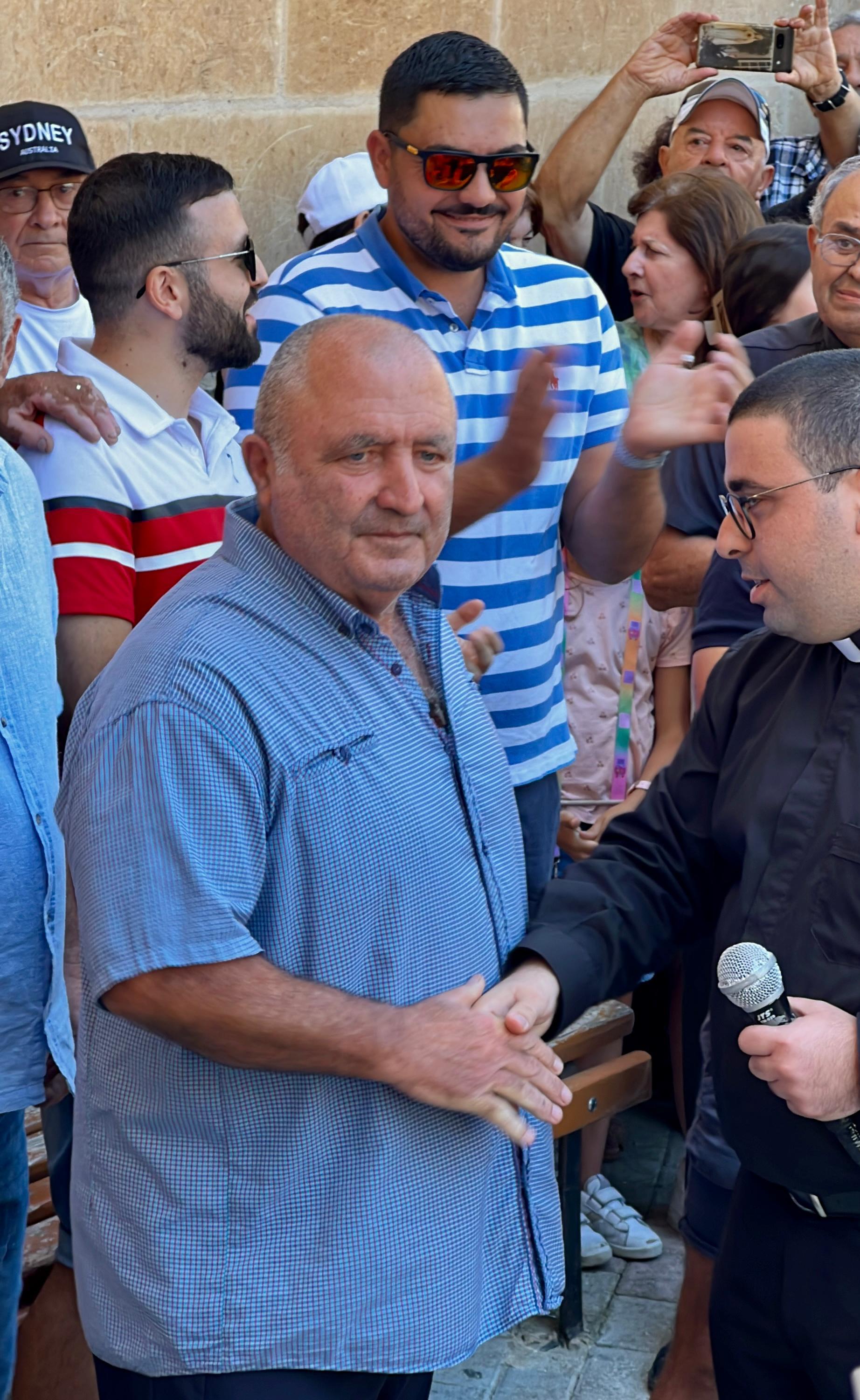 Watch: Mġarr keeps tradition alive as family bids €35,200 to carry statue