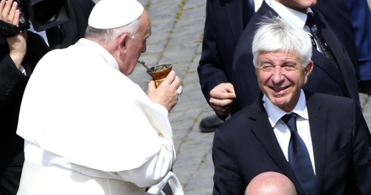 Pope poses for 'selfies' with young