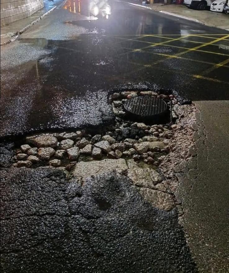 Rain routinely turns Valley Road pothole into dangerous 'crater'