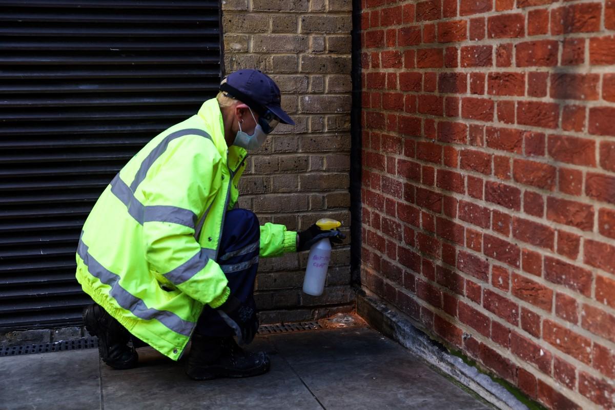 London takes aim at public peeing with splash-back paint