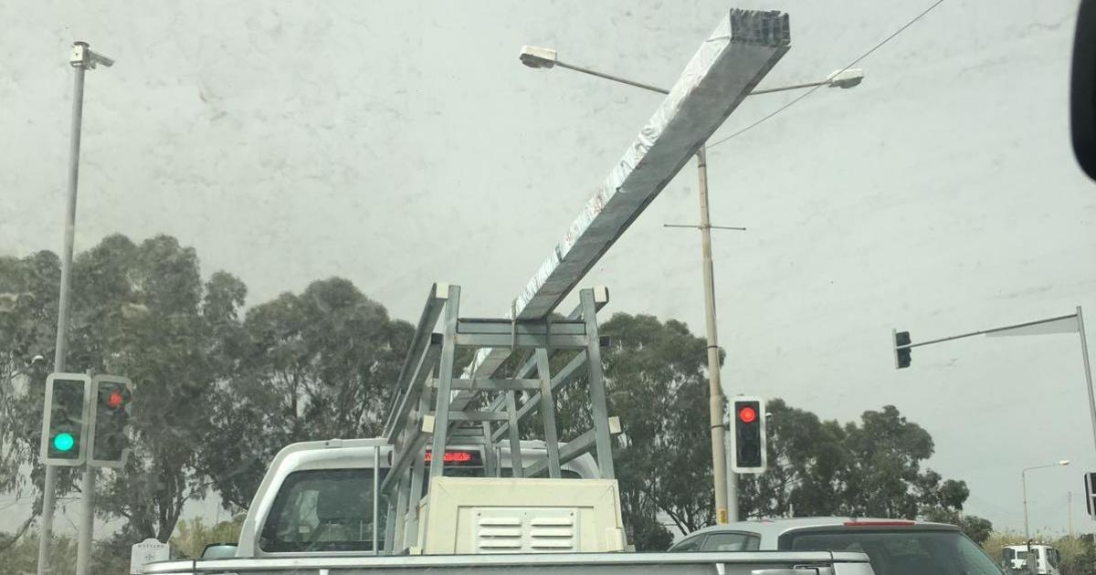 Protruding load lands pickup driver in road safety trouble