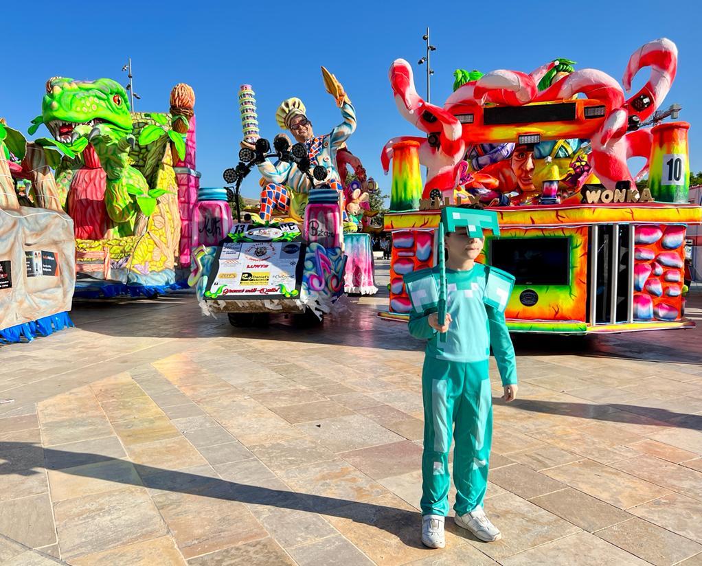 Carnival returns... three months late but colourful as ever