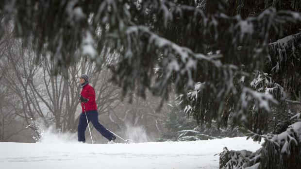 Heavy snow, dangerous cold bite northeastern US