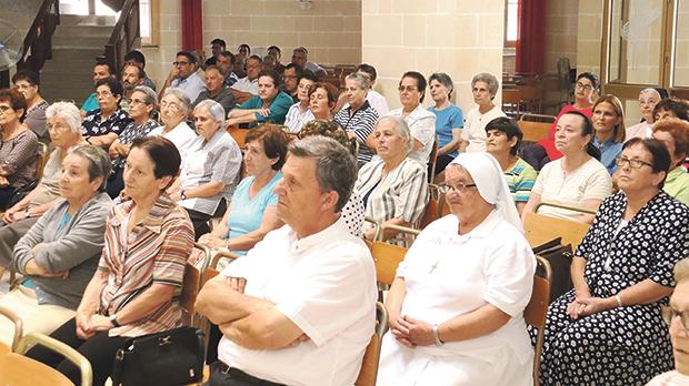 Catechists attend Mass, meeting