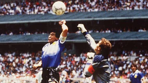 Maradona hugs 'hand of God' ref