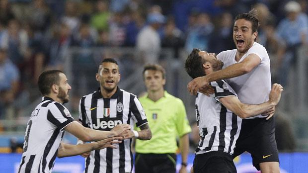 Juve keep treble hopes alive