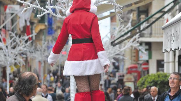Santa... stilts and stockings